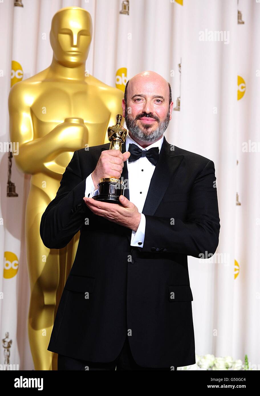 Mark Bridges with the Achievement in Costume Design award, received for ...
