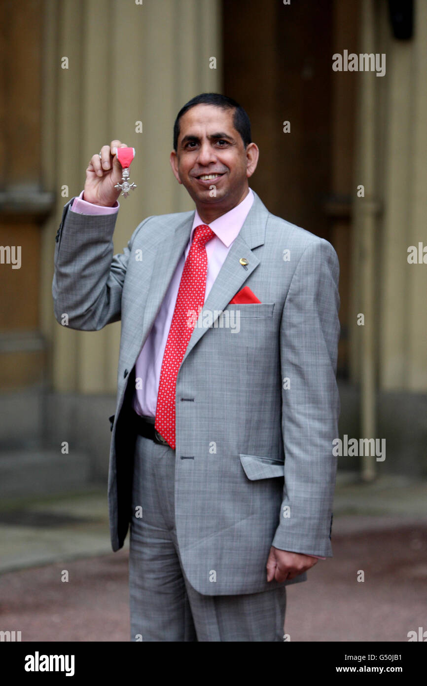 Mohamed Uddin with his Member of the British Empire (MBE) medal ...