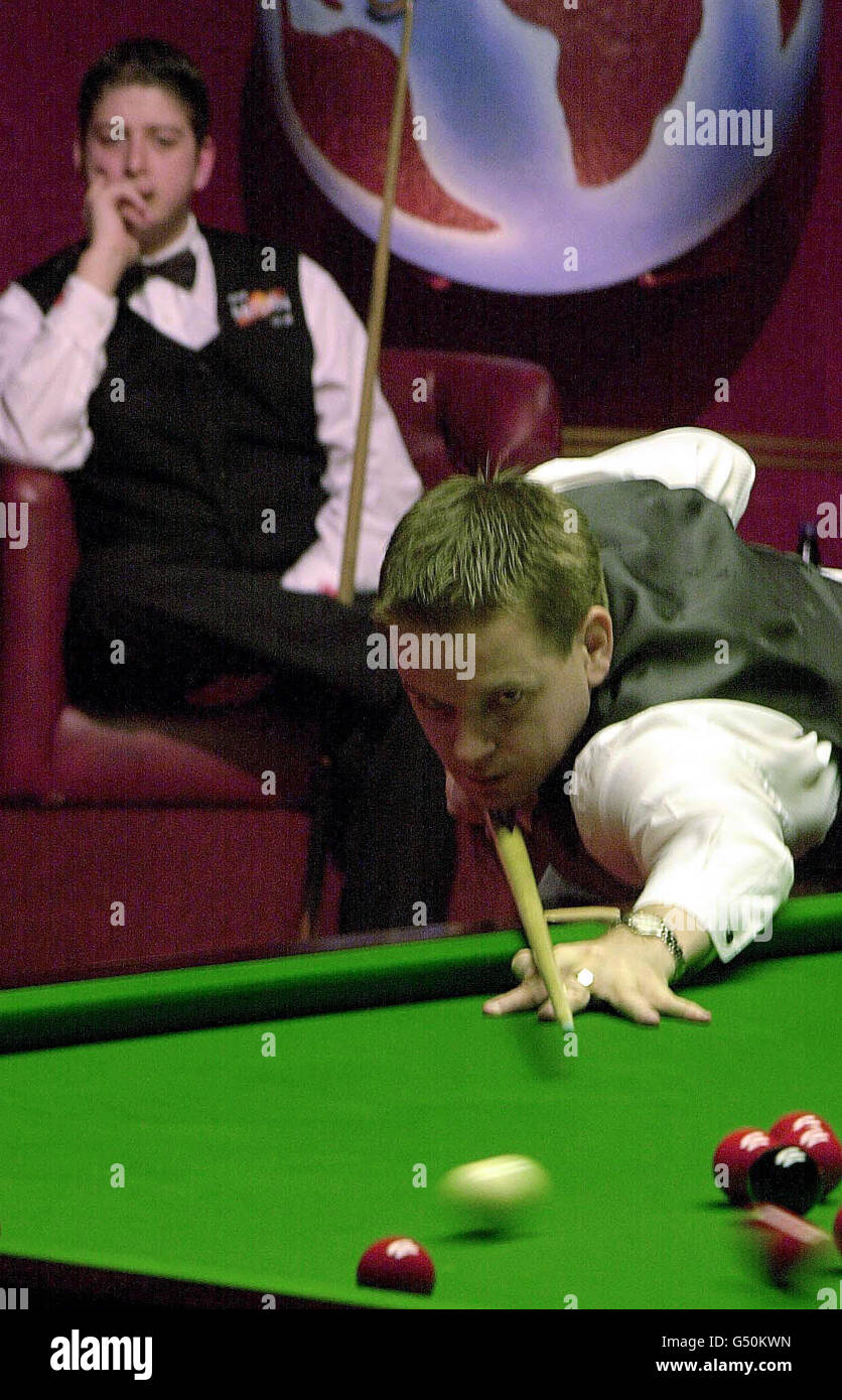 Wales' Matthew Stevens watches Northern Ireland's Joe Swail in action ...