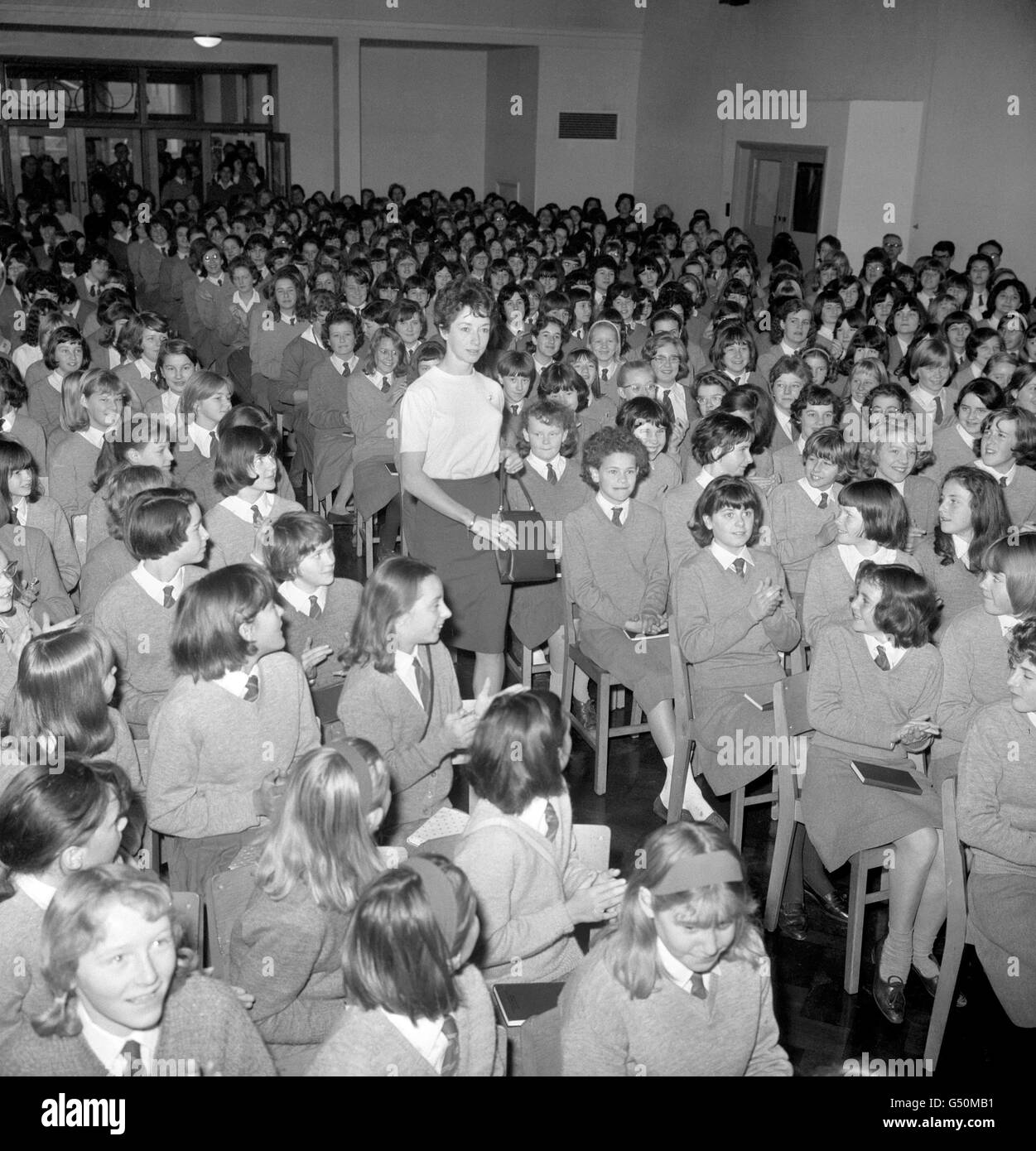 Olympic gold medalist Ann Packer arrives to a rapturous applause in the ...