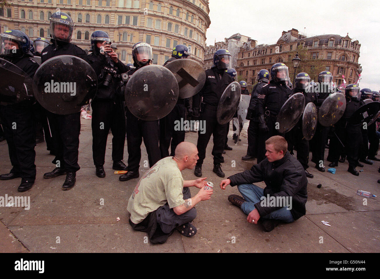 Protesters sit down in trafalgar square hi-res stock photography and ...
