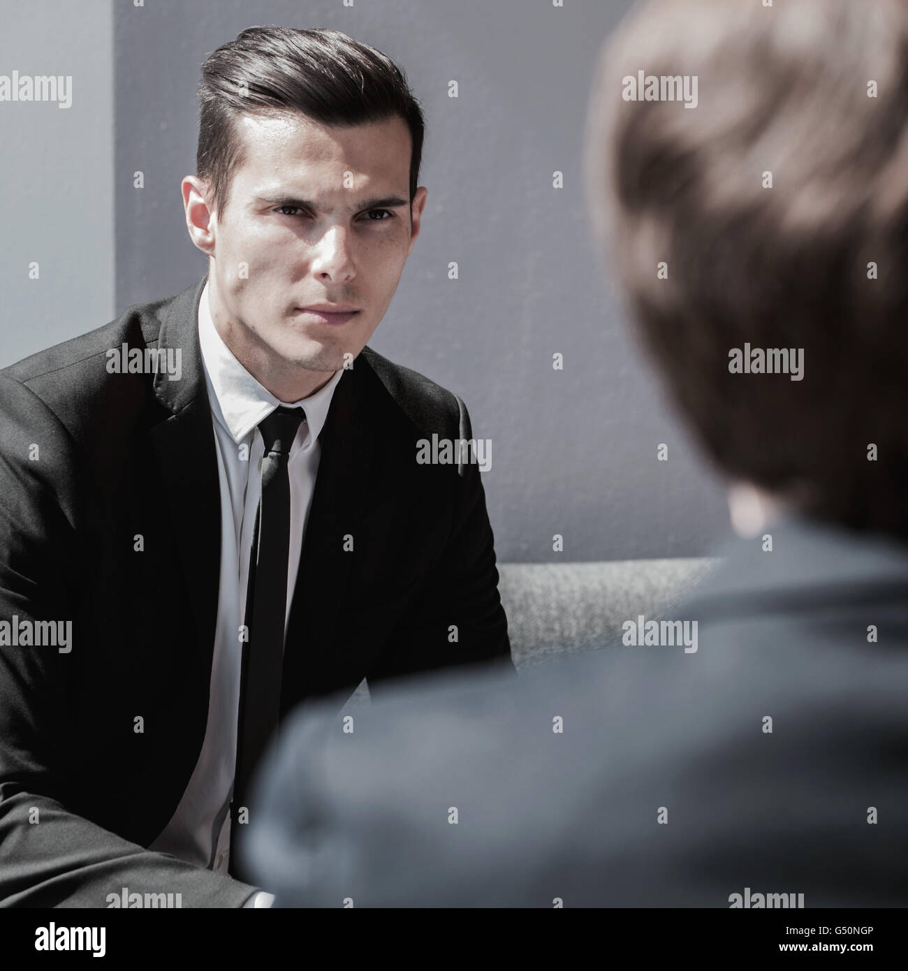 Two Business men talking at office Stock Photo - Alamy