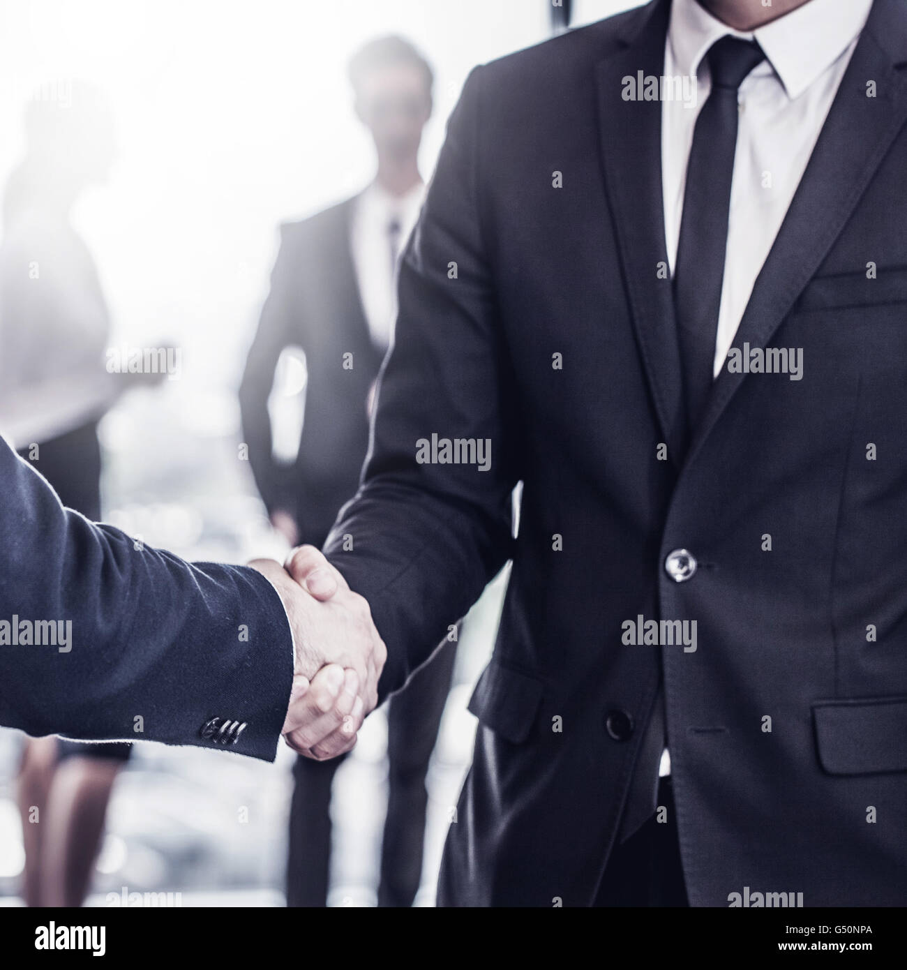 Team handshake hi-res stock photography and images - Alamy