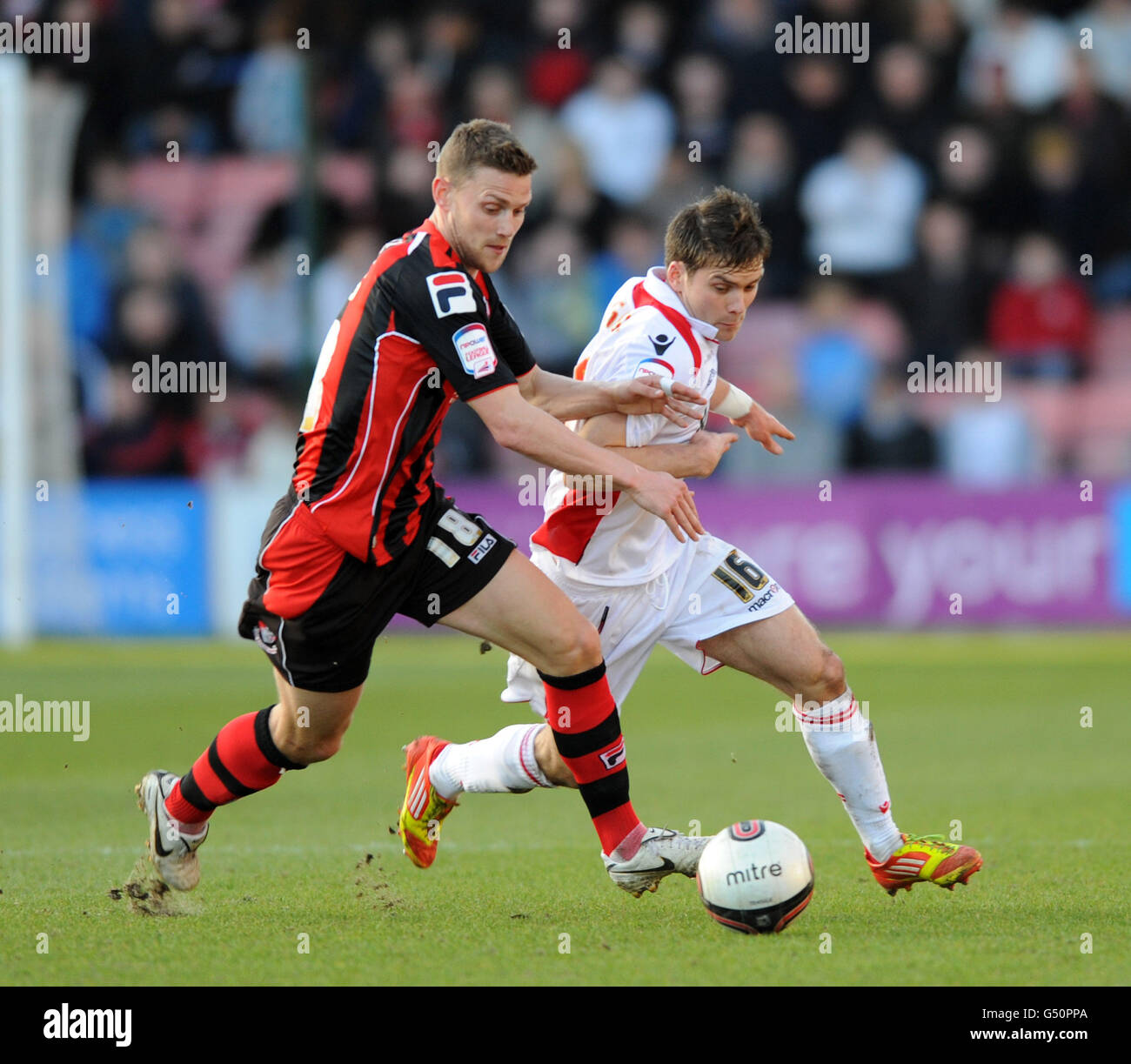 Bournemouth's Simon Francis and Charlton's Rhoys Wiggins (right) battle ...