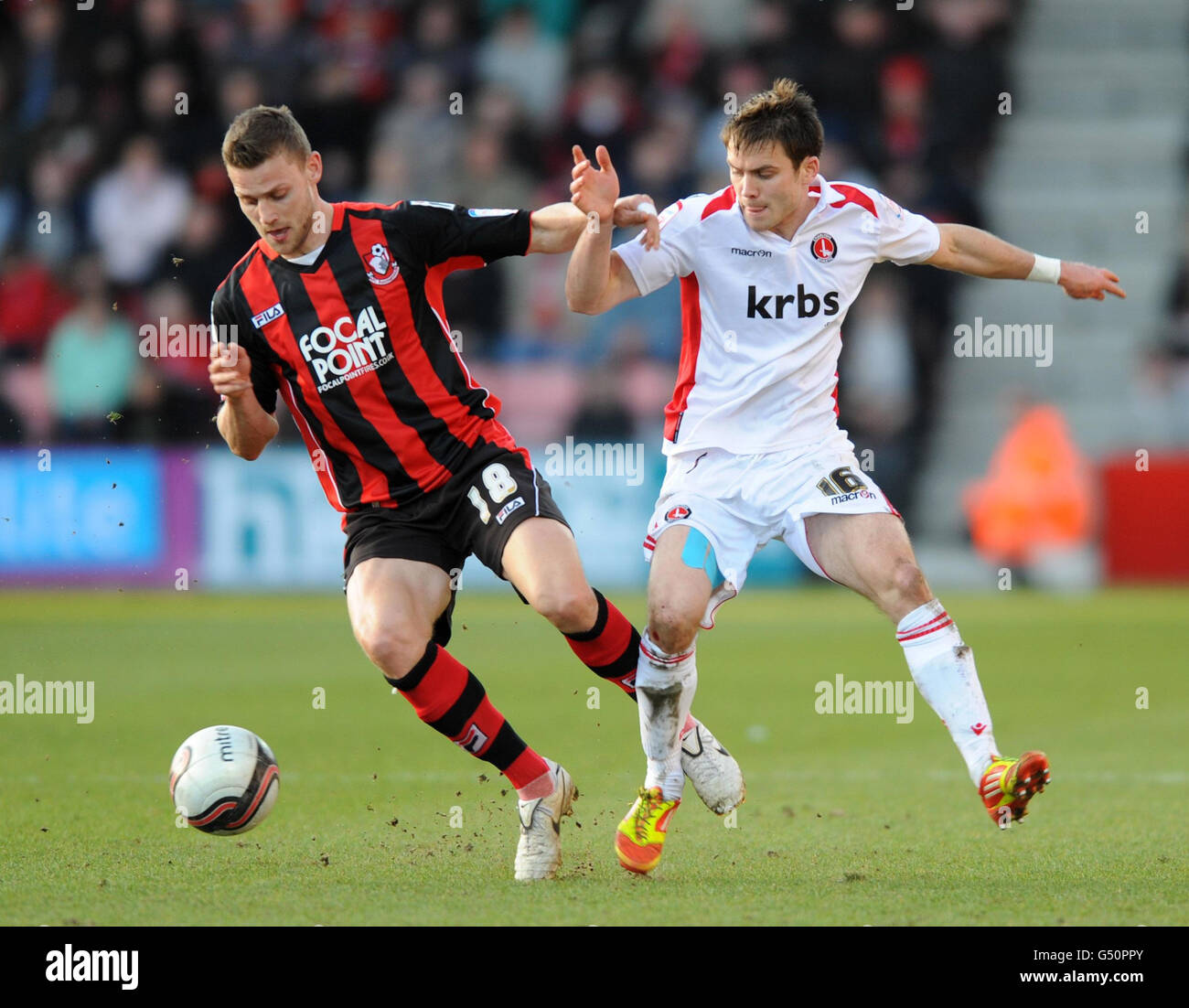 Bournemouth's Simon Francis and Charlton's Rhoys Wiggins (right) battle ...