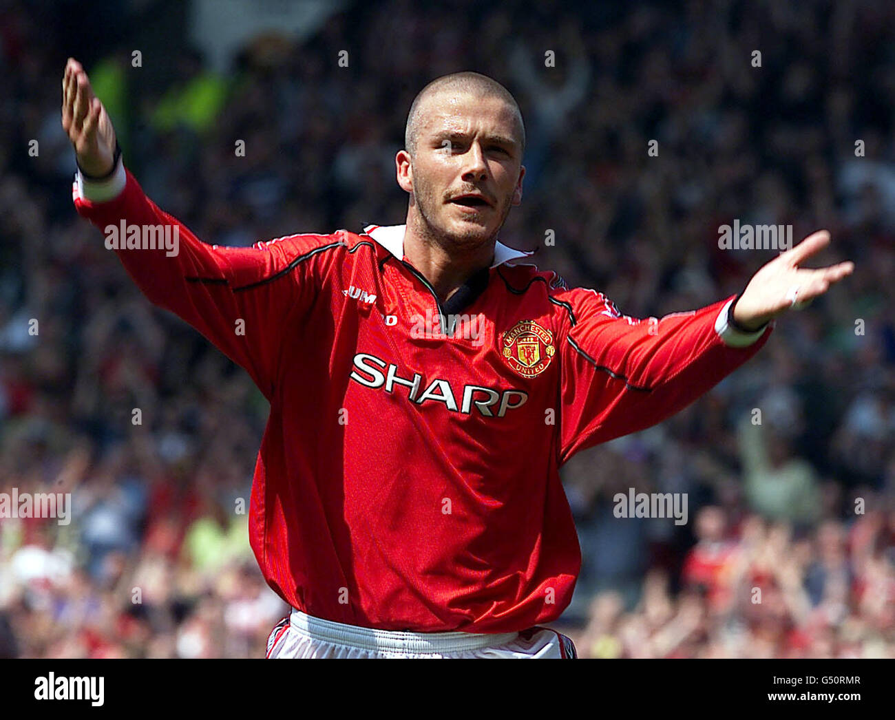 Manchester United's David Beckham celebrates after scoring the second ...