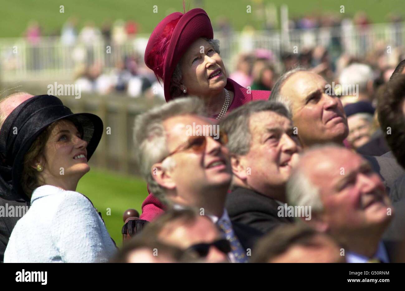 Queen Elizabeth II watches the RAF Falcons Parachute Display Team land ...