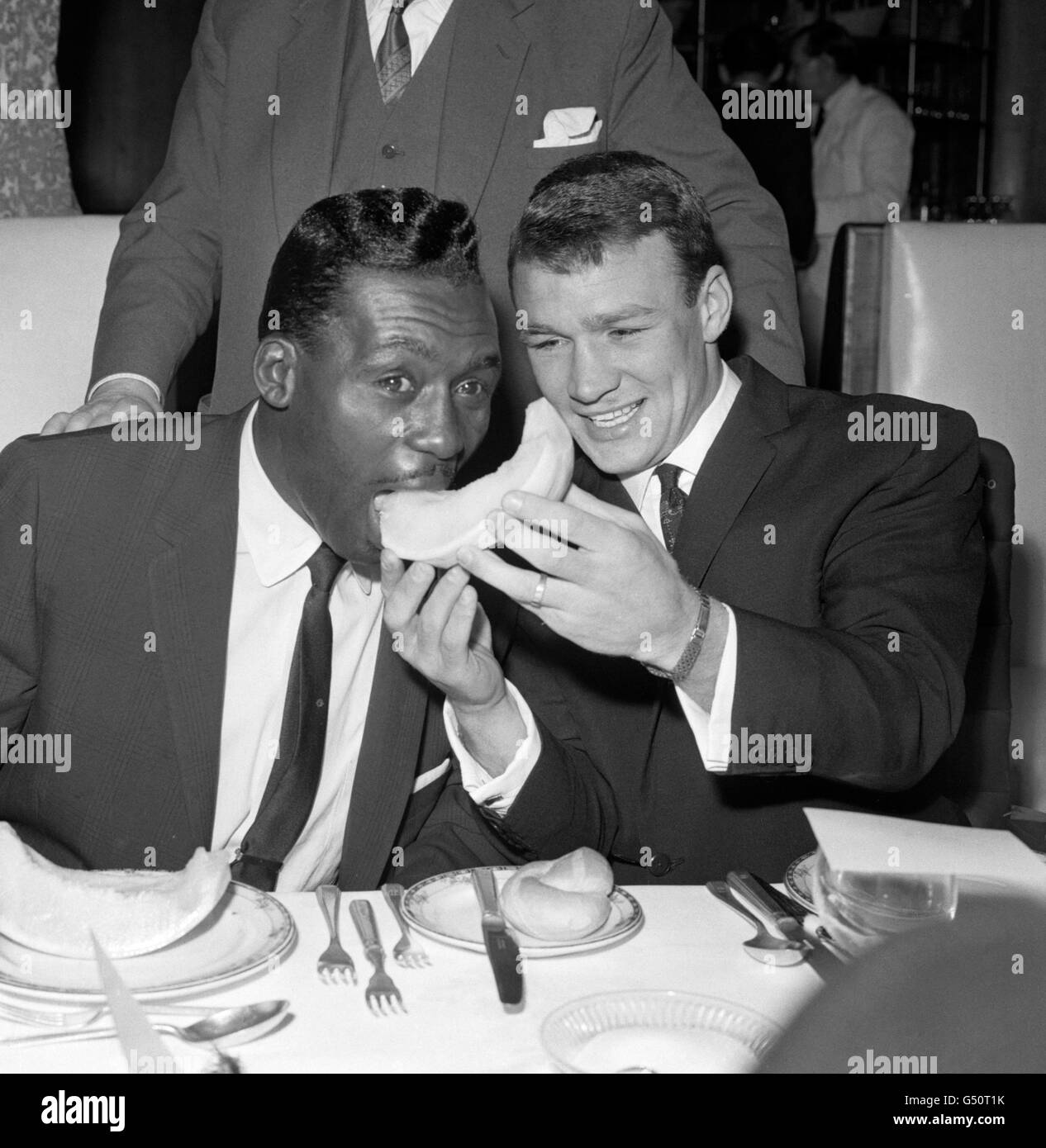 World Lightweight title challenger Dave Charnley (r) hopes the Champion ...