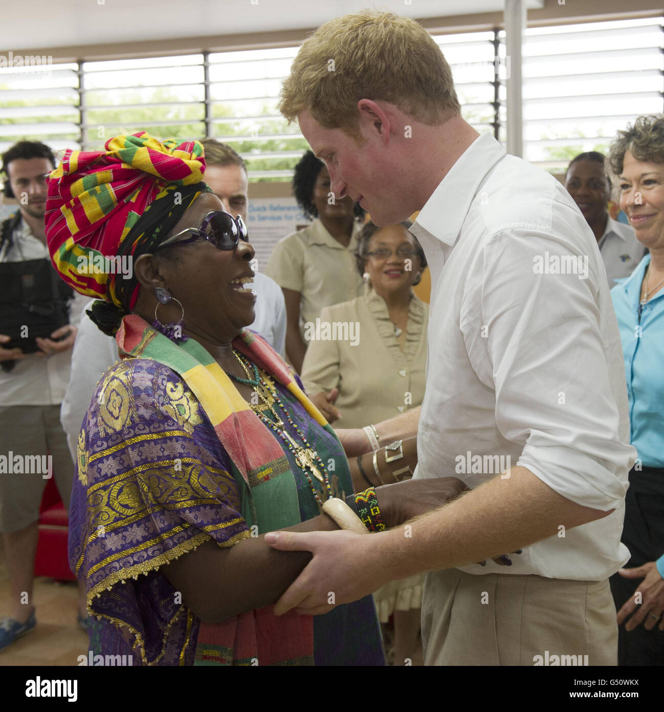 Prince Harry meets Rita Marley, widow of singer Bob Marley, as the ...