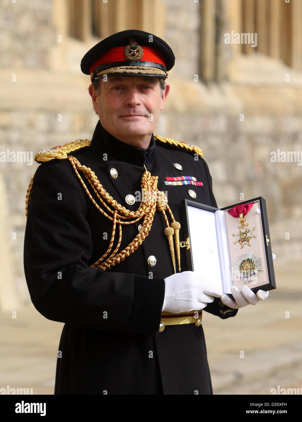 Lieutenant general sir mark mans holds his knighthood hi-res stock ...
