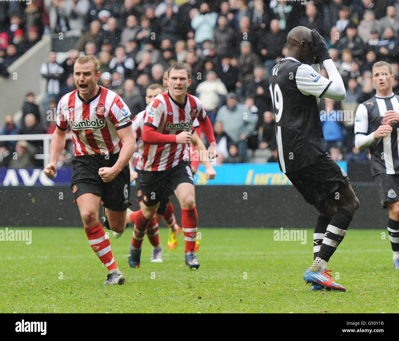 Newcastle's Demba Ba holds his head after missing a penalty during the ...
