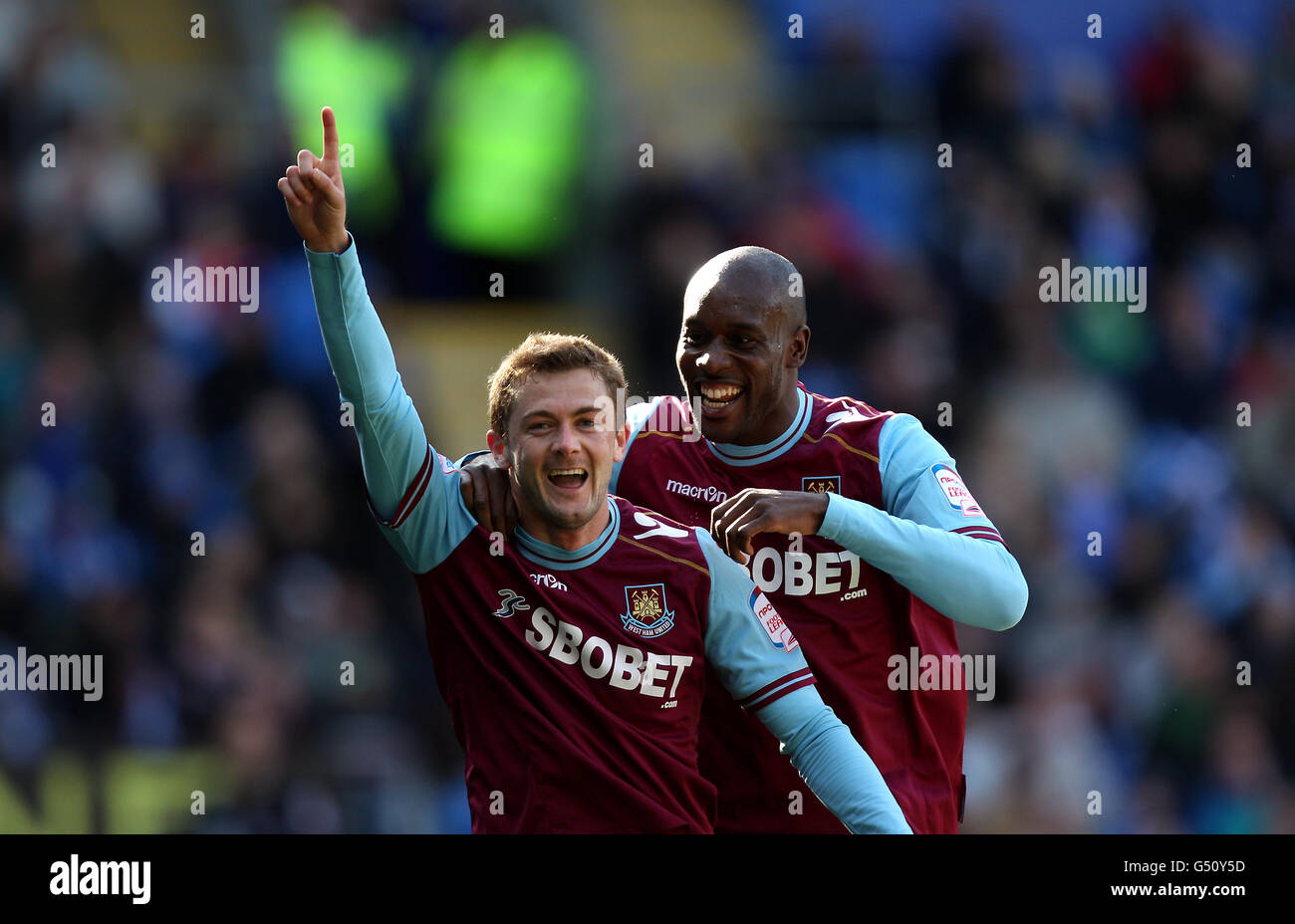 West Ham United's George McCartney (left) celebrates scoring their ...