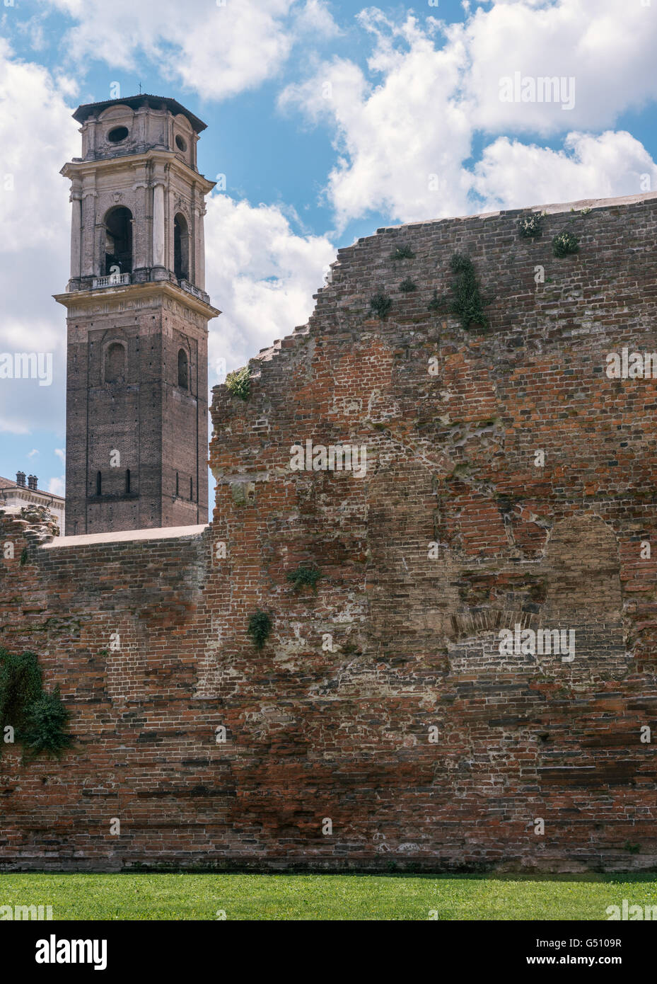 Ancient roman ruins in Turin city centre with Christian church bell ...