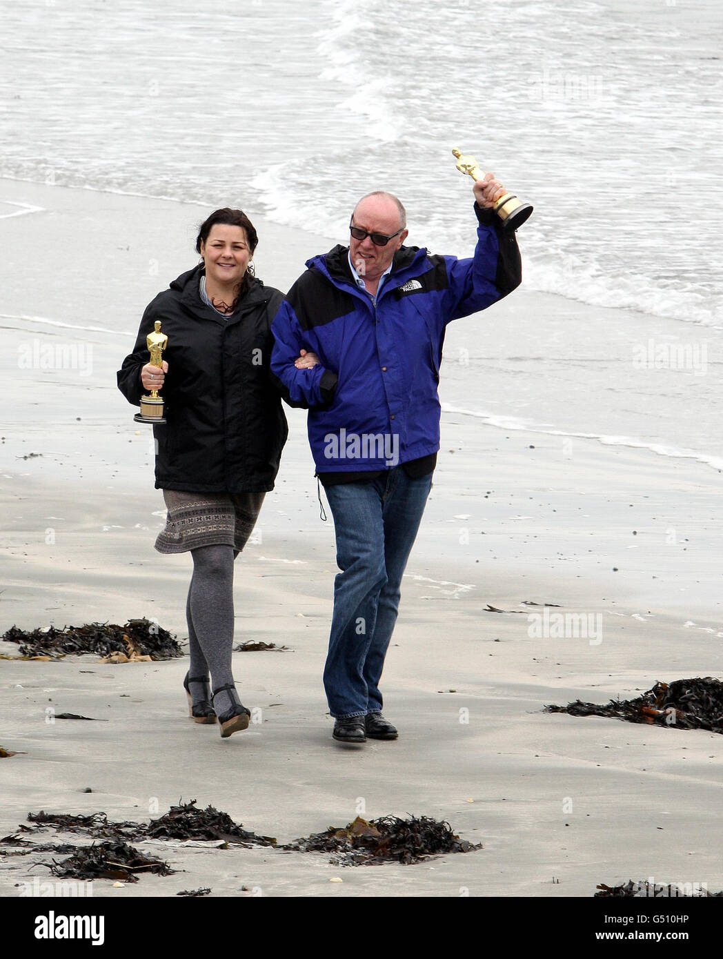Oscar winner Terry George with his daughter Oorlagh holding their ...