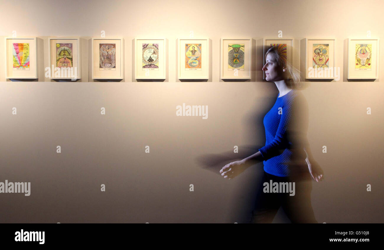 Ruth Fenton walks by the re-imagined tarot cards which are part of ...