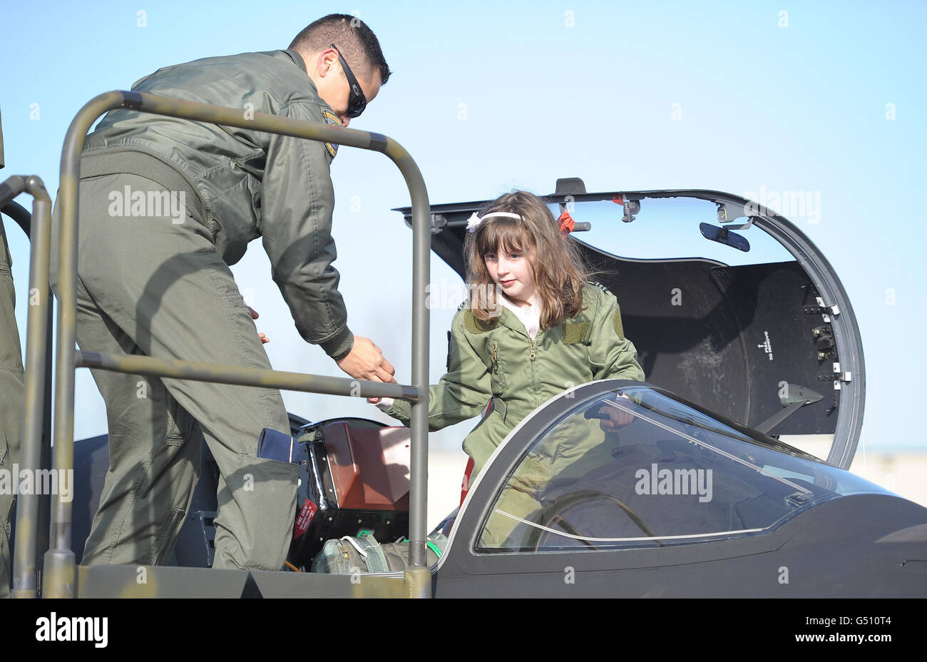 Nine-year-old Ellie Carter, from Devon, gets into the cockpit of a USAF ...