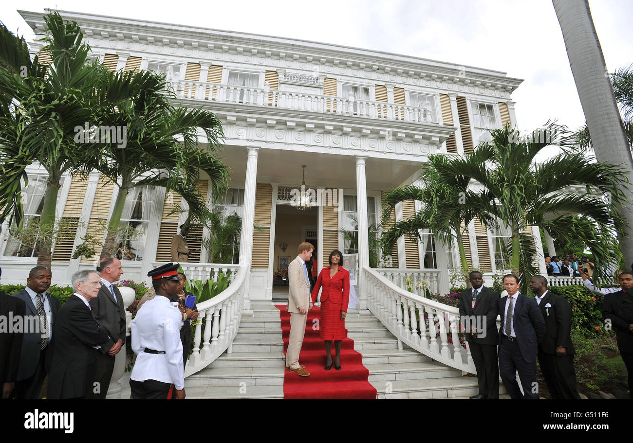 Prince Harry with the Prime Minister of Jamaica Portia Simpson Miller ...