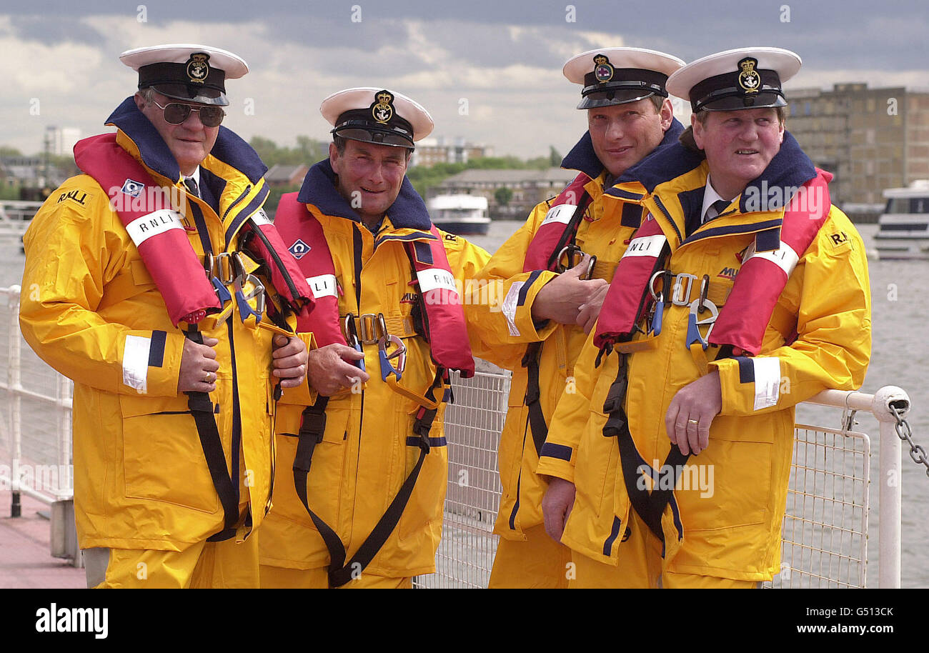 Lifeboat crew, from left, coxswain Bill Farquhar, from Thurso, Scotland ...