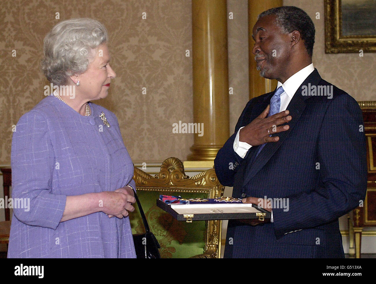 Britain's Queen Elizabeth II presents South African President, Thabo ...