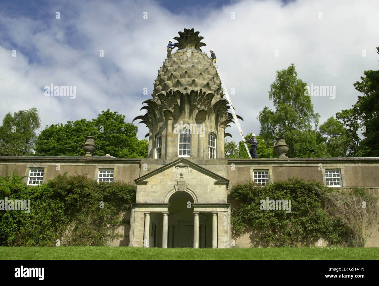 Pineapple building restoration Stock Photo - Alamy