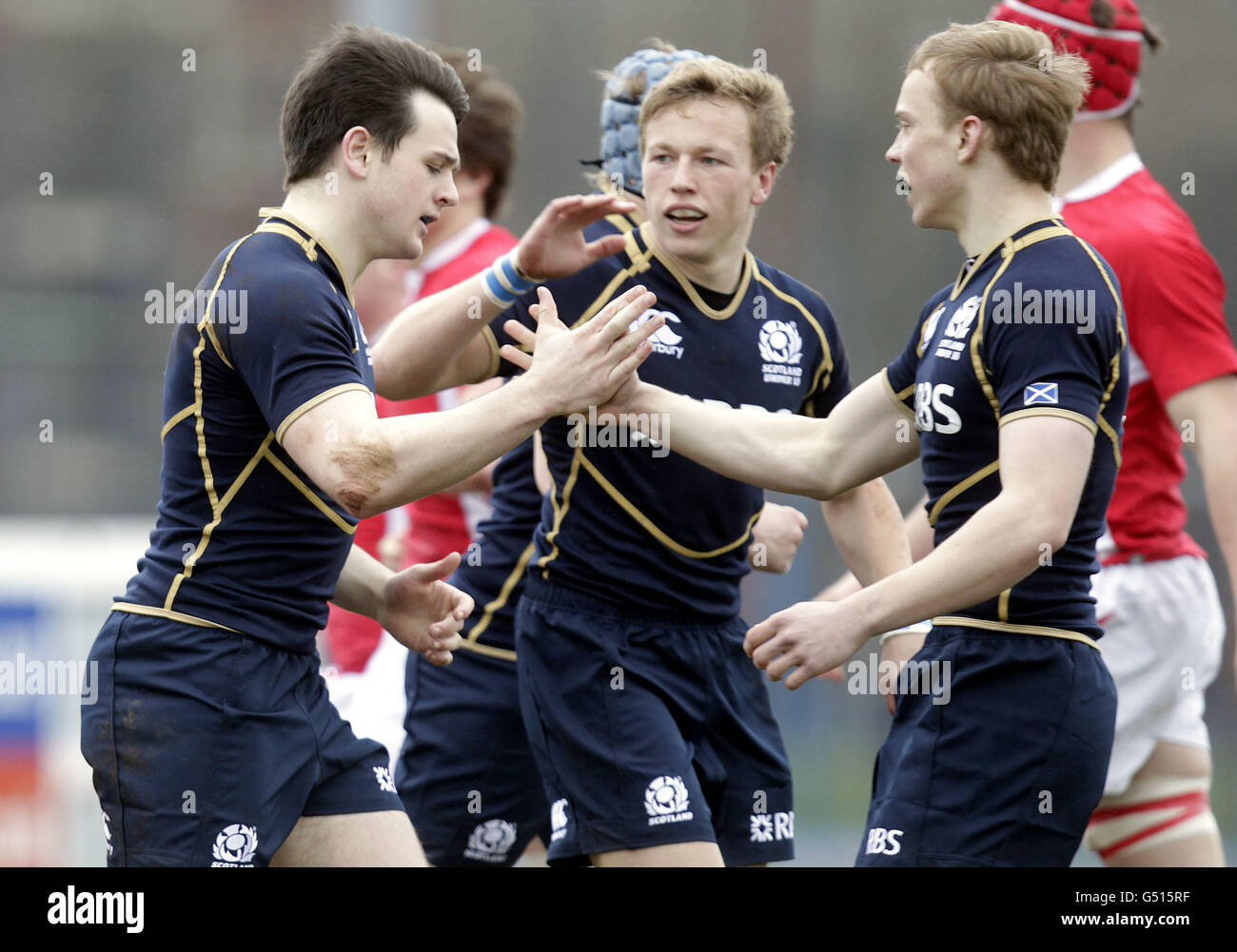 Scotland under 18's Sean MacDonald (left) celebrates scoring their ...