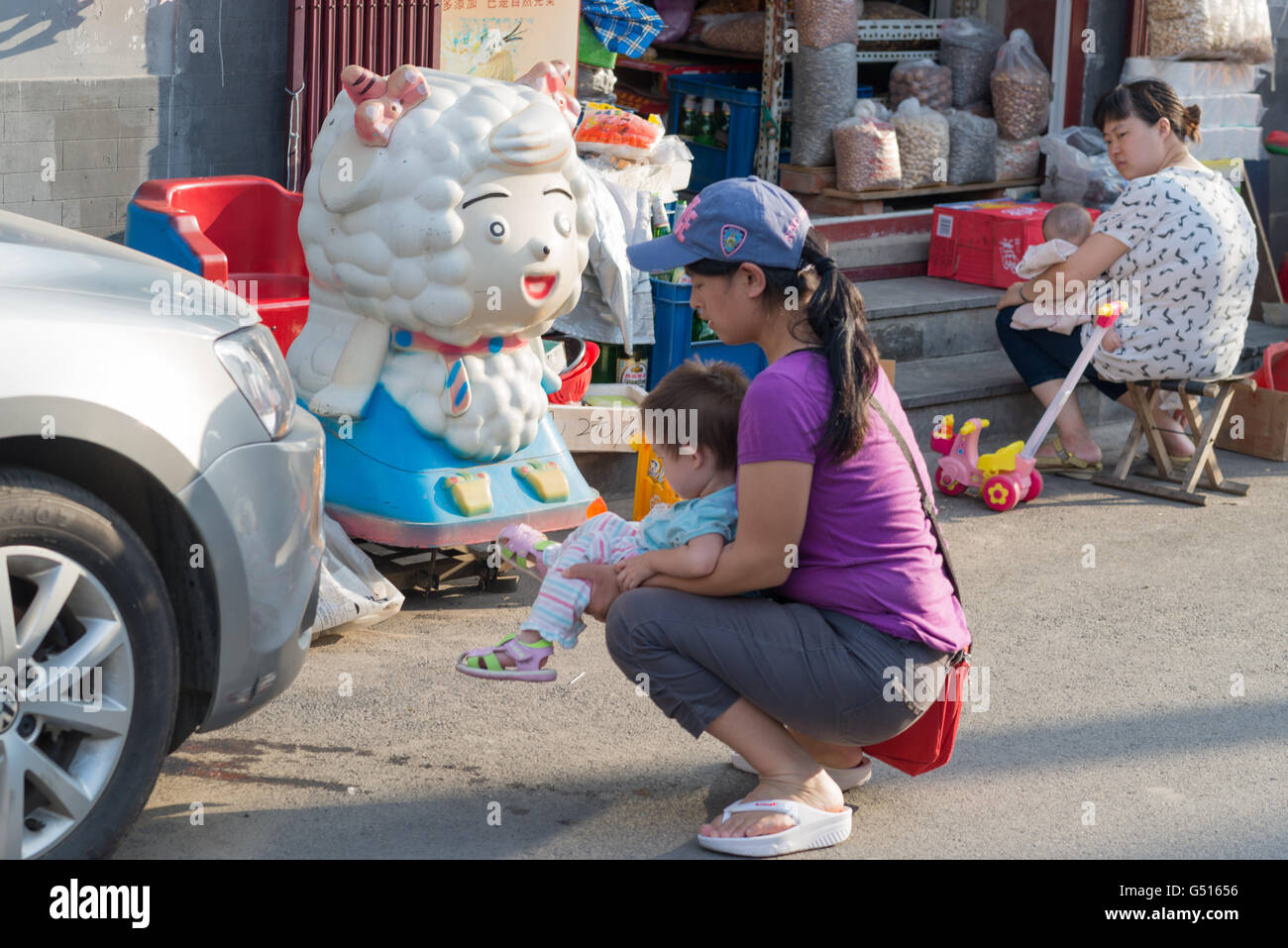 China, Beijing, Little child peeing in the streets Stock Photo - Alamy