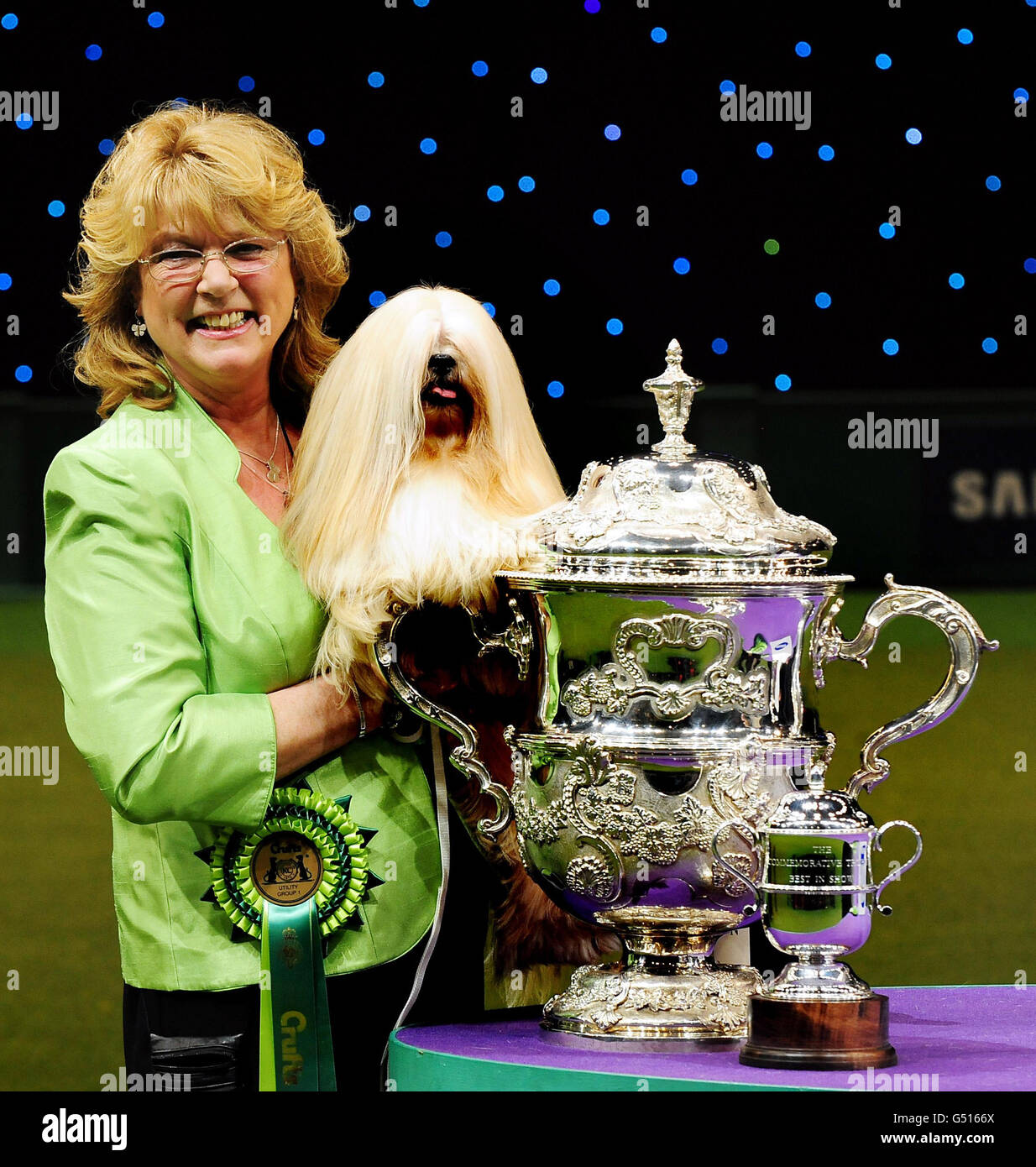 Elizabeth, a Lhasa Apso, winner of the Best in Show title, with owner ...