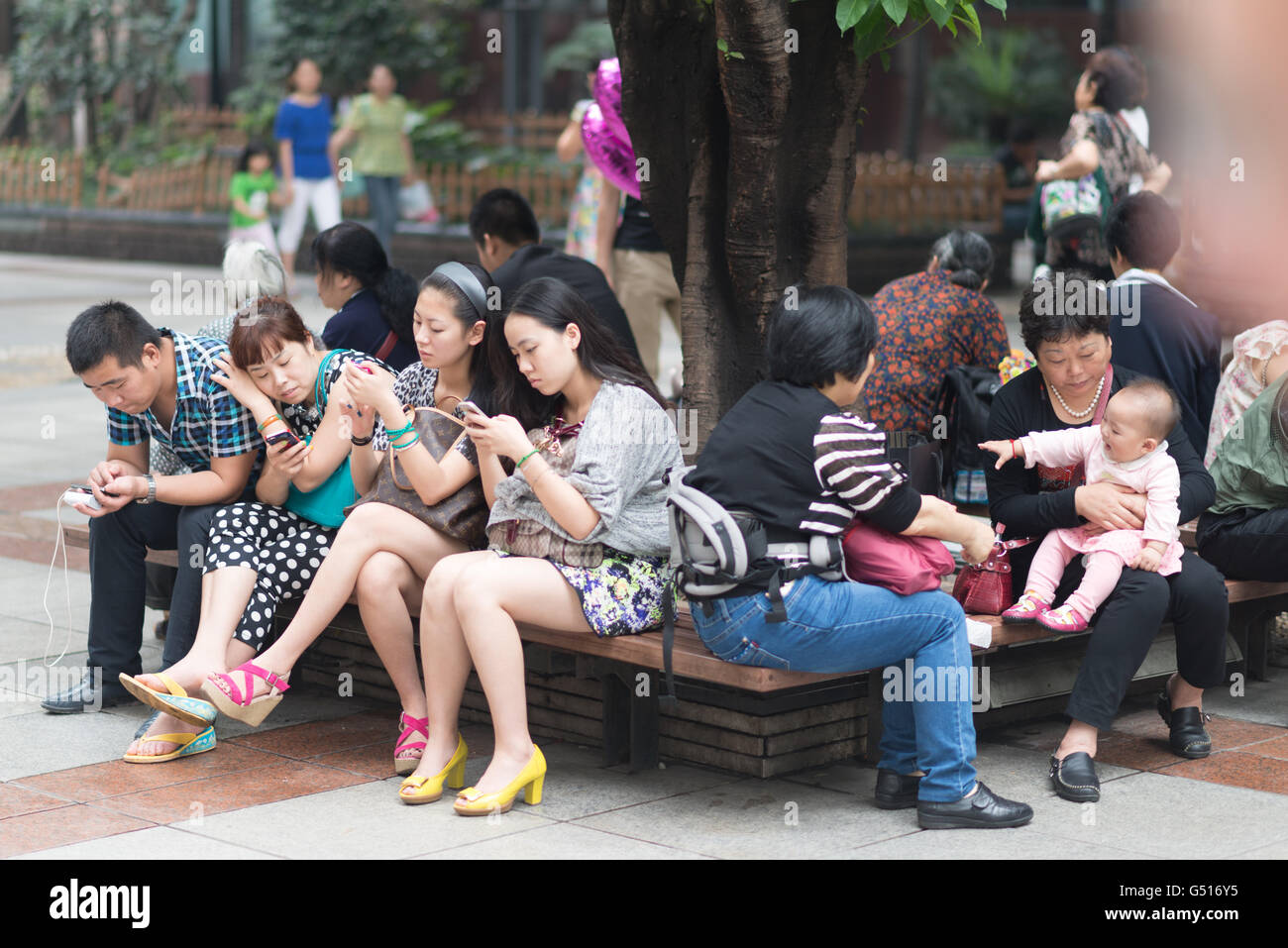 China, Chongqing, seating benches to linger on the streets Stock Photo ...