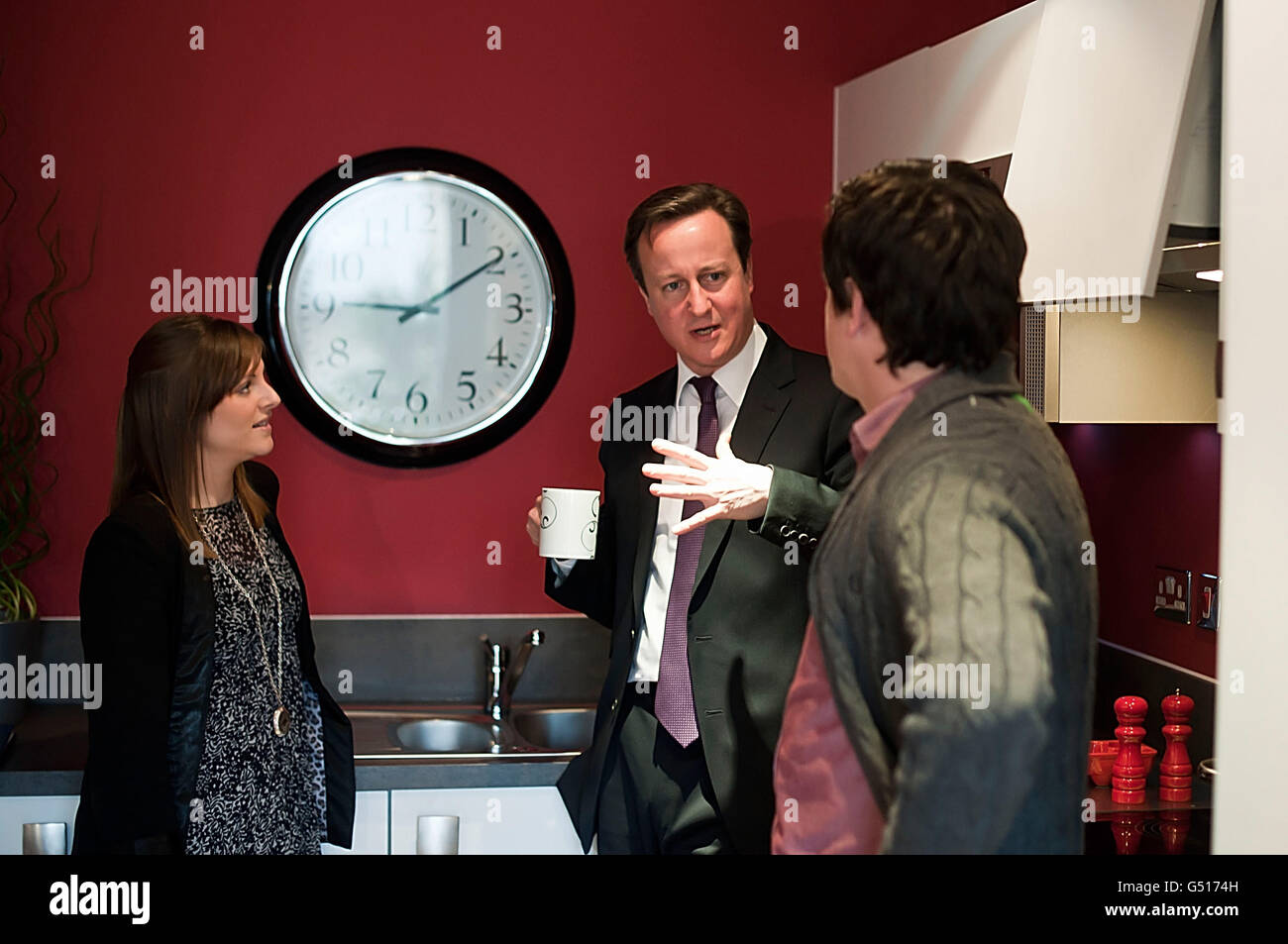 Prime Minister David Cameron speaks to a young couple, Lianne Cowdry ...