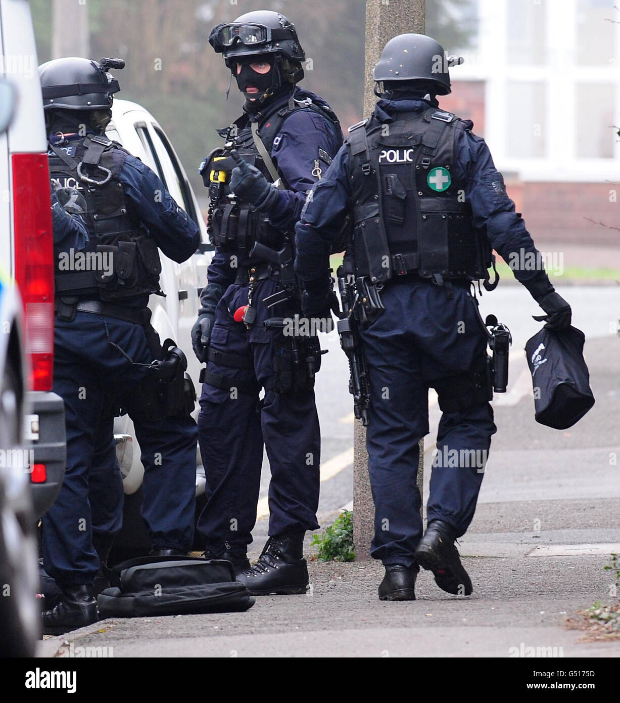 Armed police at Perry Hill Road, in Sandwell, West Midlands as Police ...