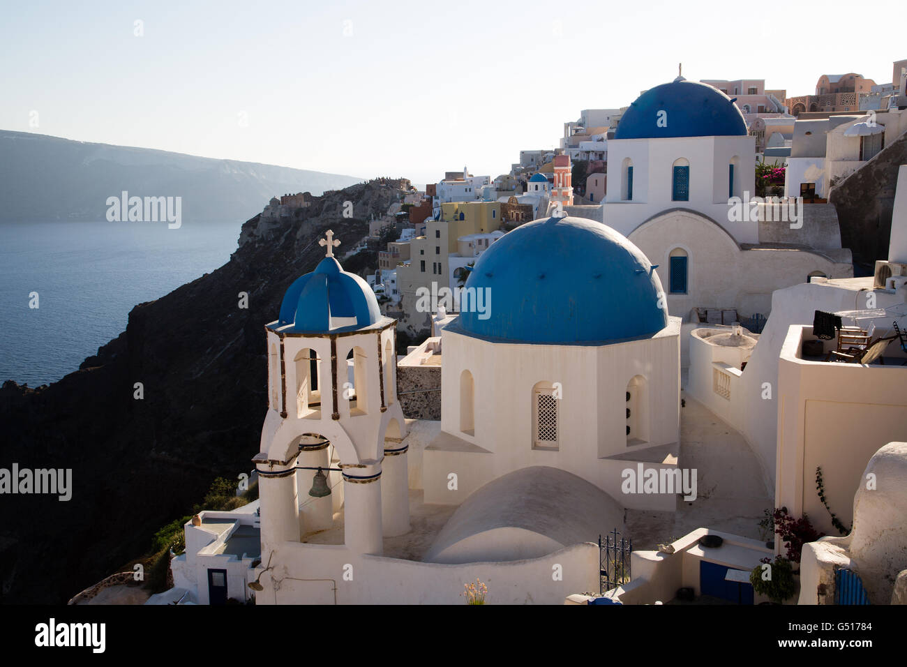 Blue domes and their bell tower in Oia. Santorini Stock Photo - Alamy