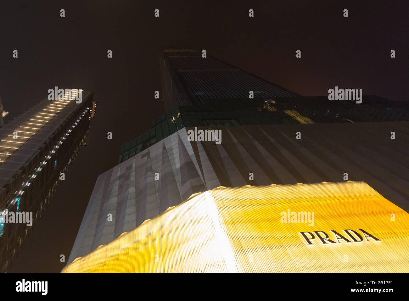 China, Chongqing, Prada department store at night at Time Square in ...