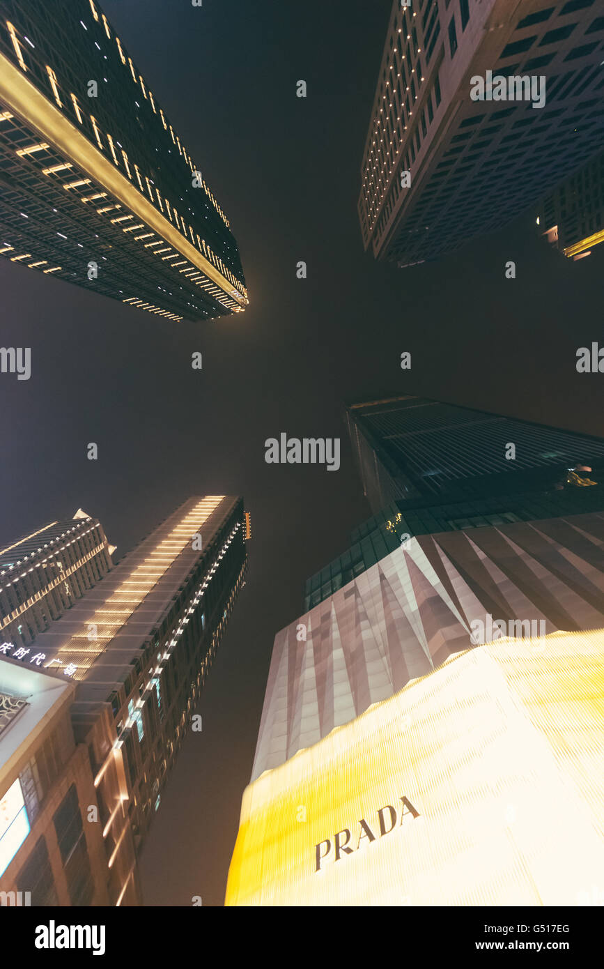 China, Chongqing, Prada department store at night at Time Square in ...