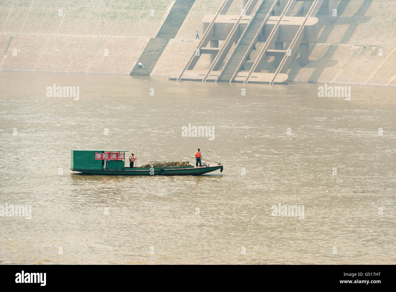 China, Chongqing, Small traditional wooden boat on the Yangtze River ...