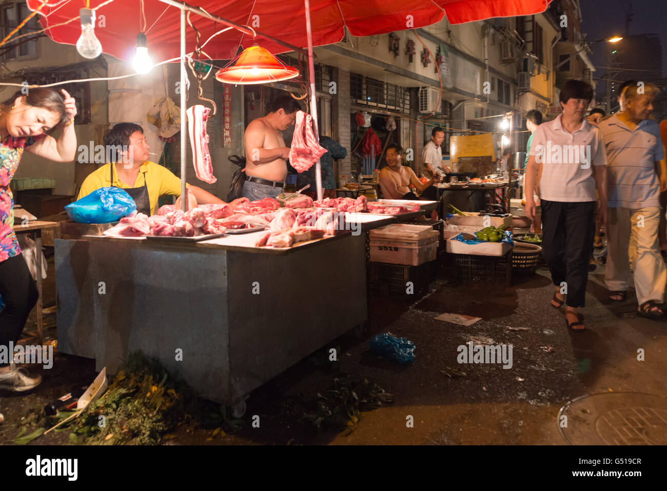 China, Shanghai, meat sellers on the street market Stock Photo - Alamy
