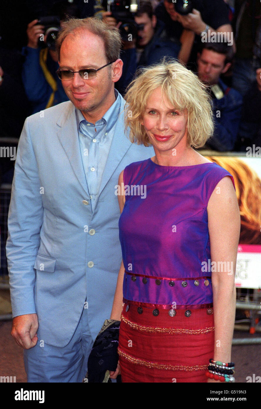 Celebrity smiling red dress sleeveless blonde sting trudi hi-res stock ...