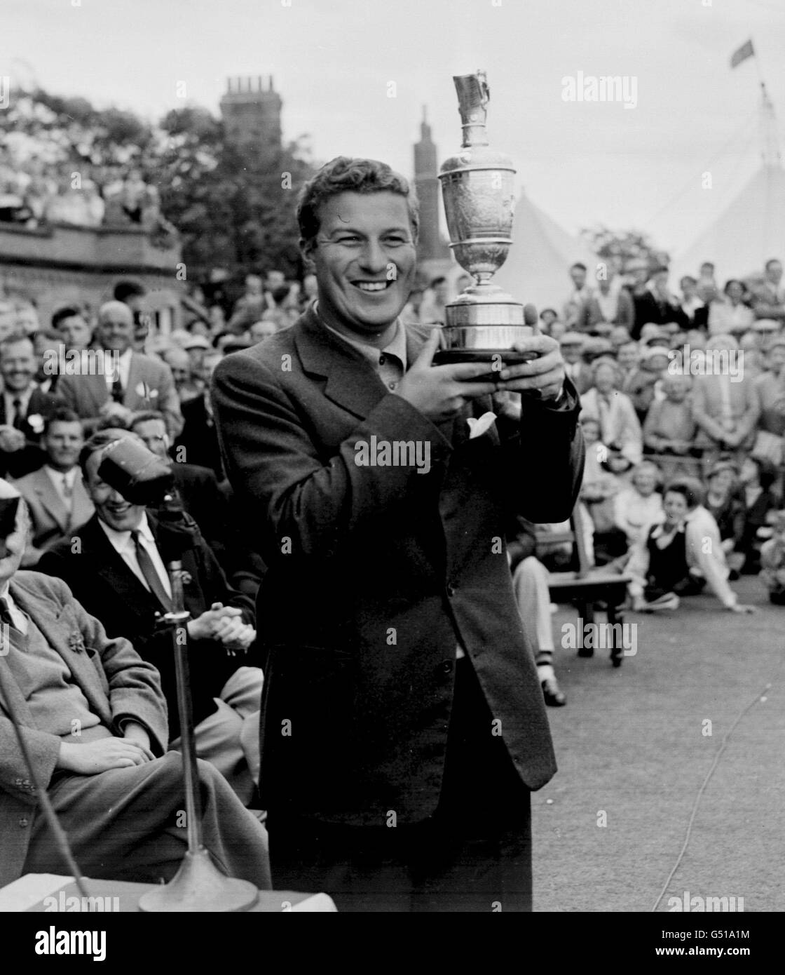 Proudly holds up the trophy at holylake hi-res stock photography and ...