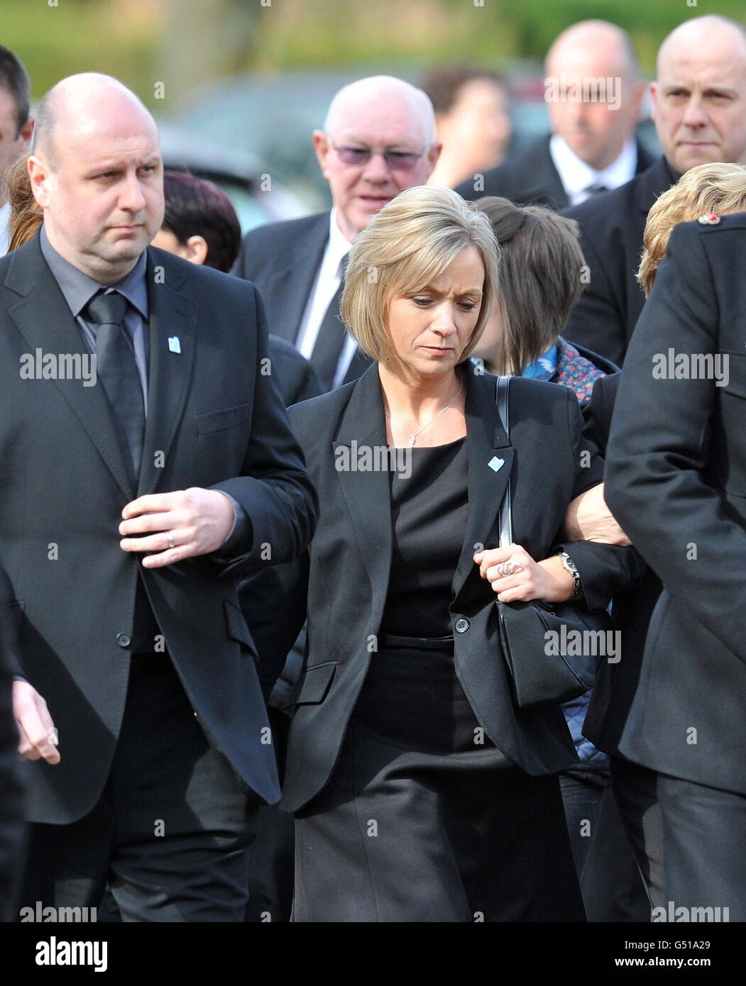 Kath Rathband (centre), the widow of Pc David Rathband, attends his ...