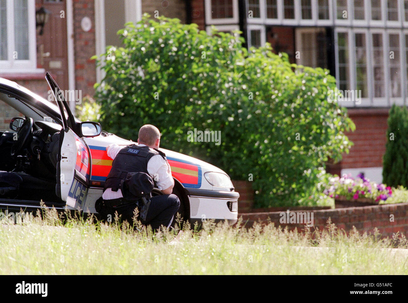 Siege armed man police watch Stock Photo - Alamy