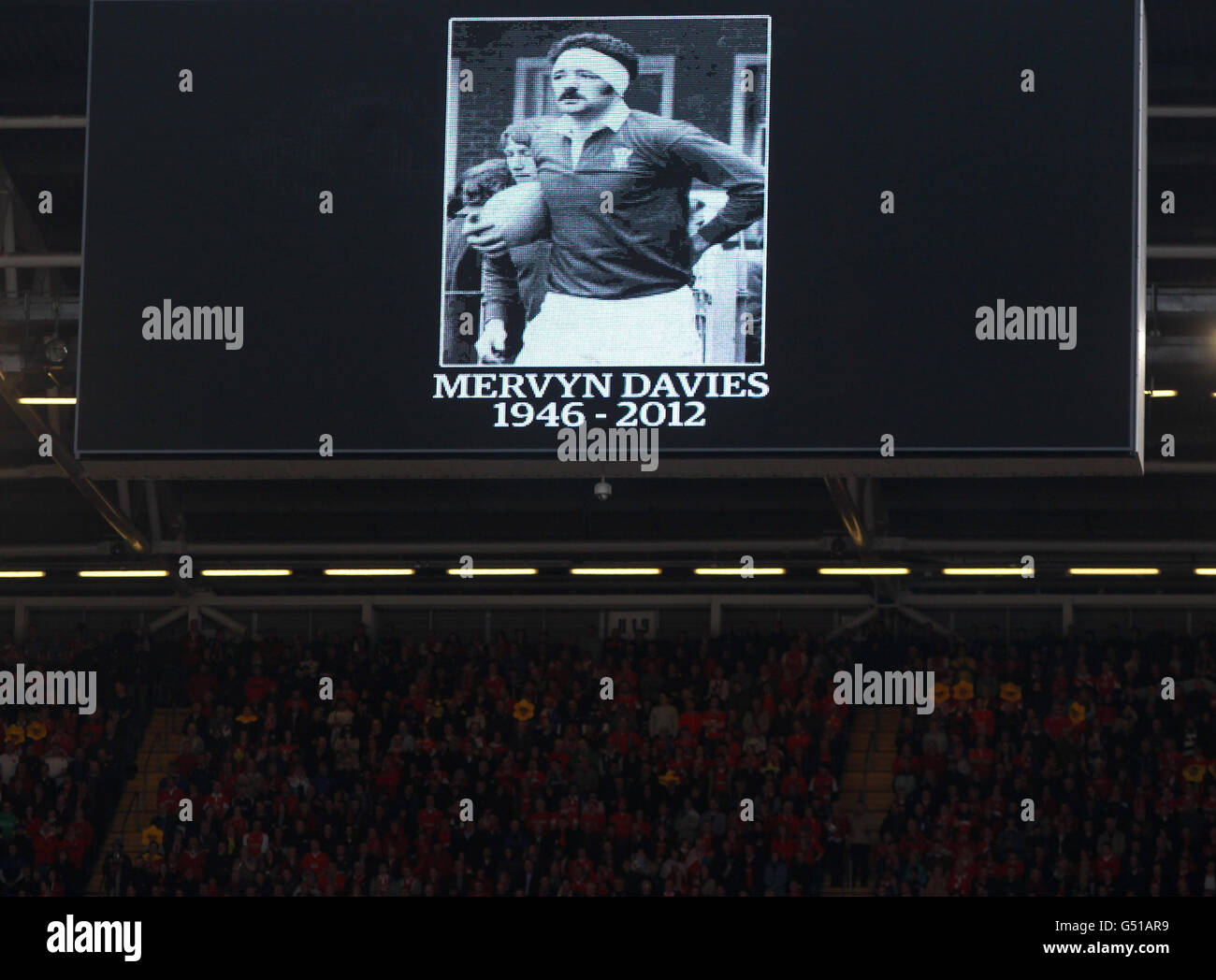 The big screen shows a picture of former Wales and Lions player Mervyn ...