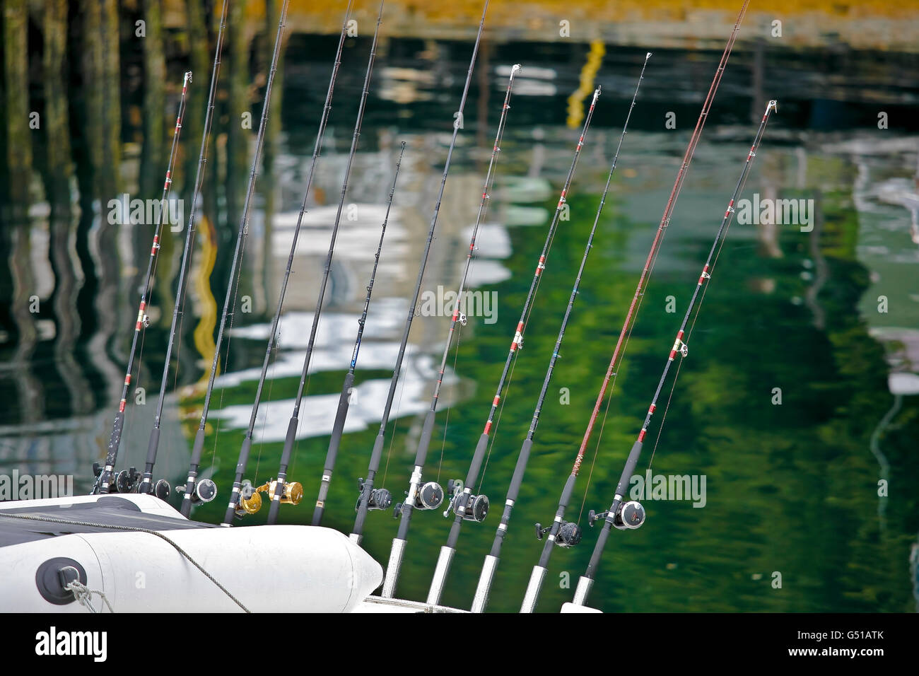 Fishing rods arrayed on boat in Pelican Harbor on the Lisianski Inlet ...