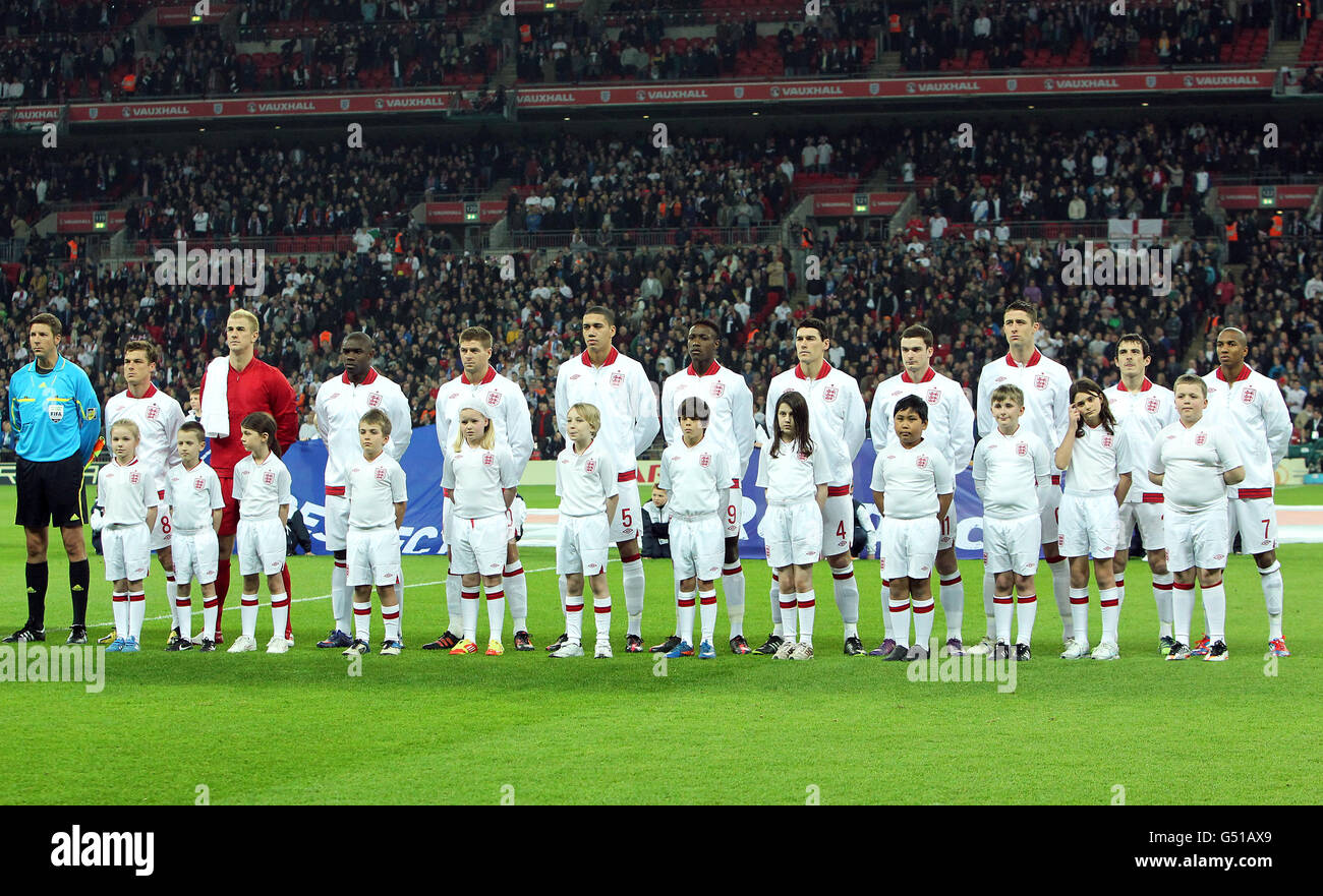 England's players line up before the match with the mascots Stock Photo ...