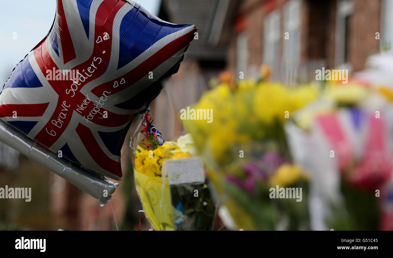 Flowers and balloons outside the family home of Private Daniel Wade in ...