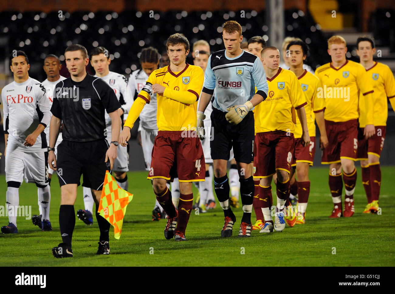 Burnley captain Alex Coleman leads out his team before the game Stock ...