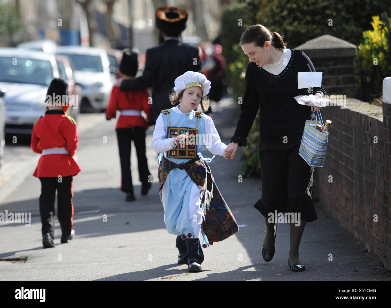 Orthodox Jews in Stamford Hill, north London celebrate Purim, a Jewish ...