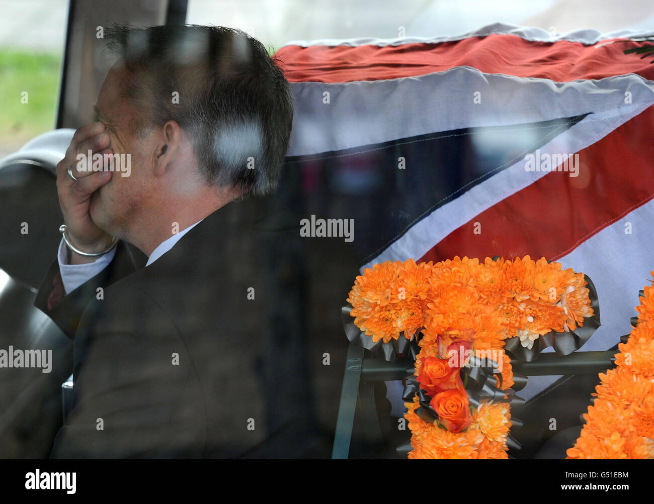 Sits along side his coffin outside etal lane police station hi-res ...