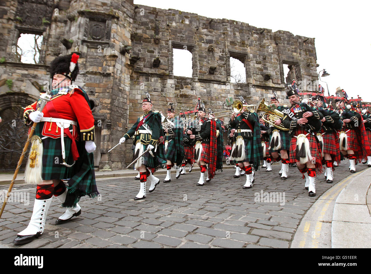The Pipes and Drums of Royal Regiment of Scotland parade from Stirling ...