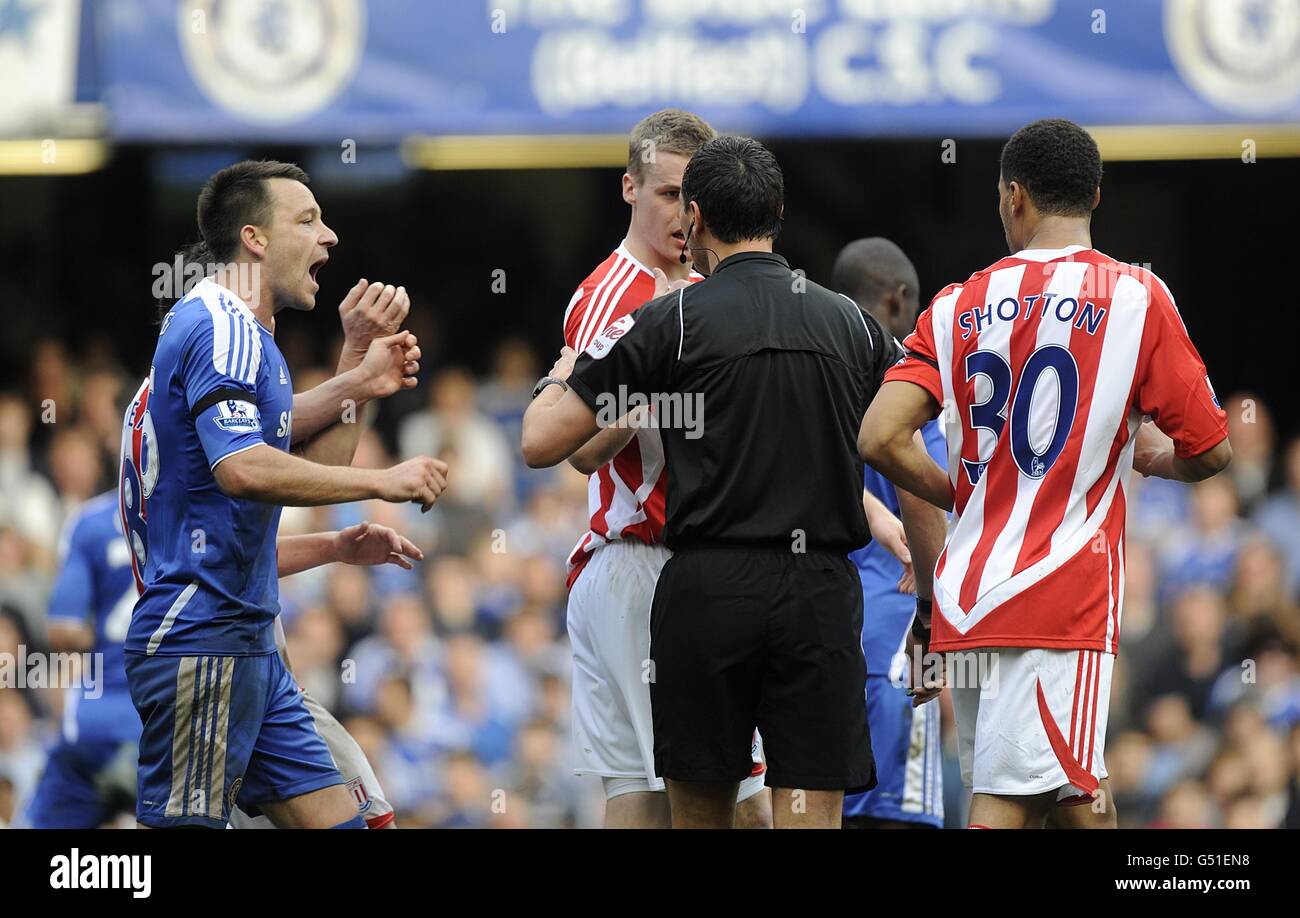 Chelseas john terry and referee andre marriner hi-res stock photography ...