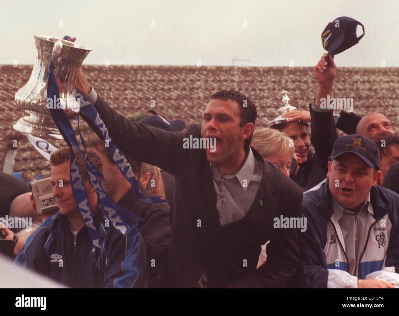 Football celebrating trophy double decker bus hi-res stock photography ...