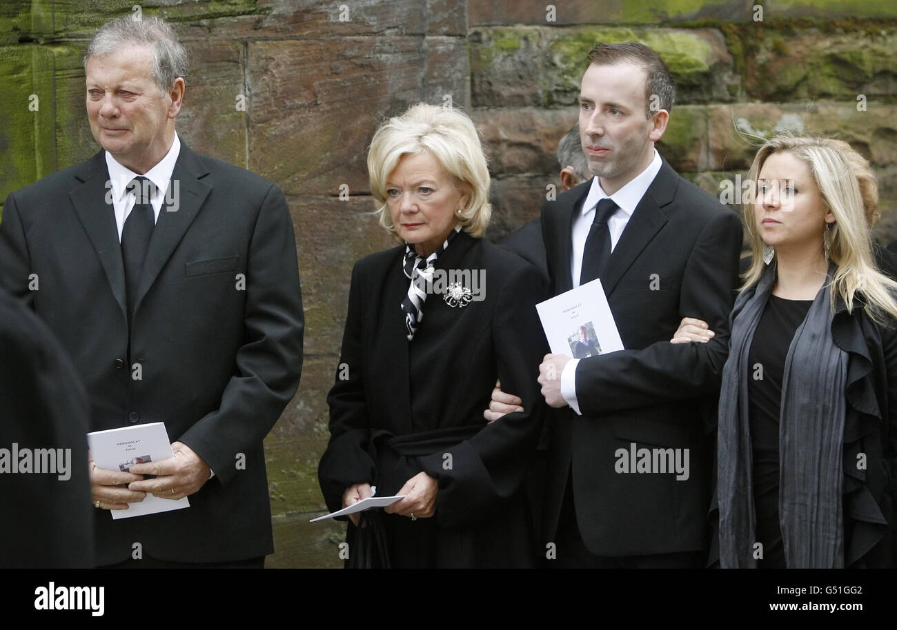Father George McBride (left), mother Mary McBride (second left ...